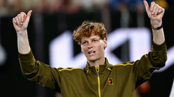 Sinner battles heat and cramps to reach Australian Open fourth round ...